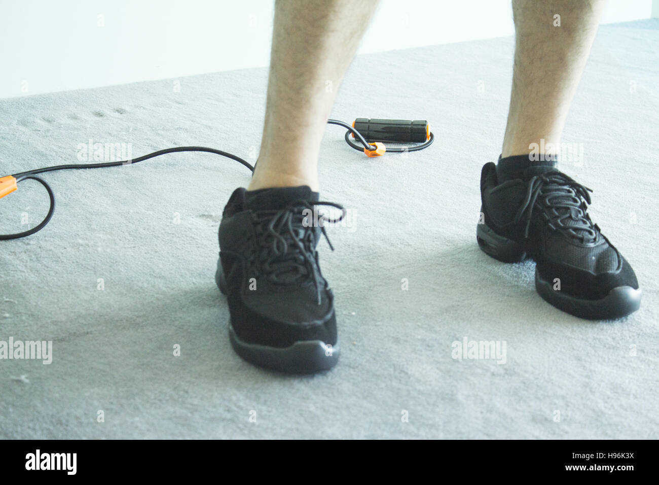 Performing exercises with resistance rope fitness Stock Photo - Alamy