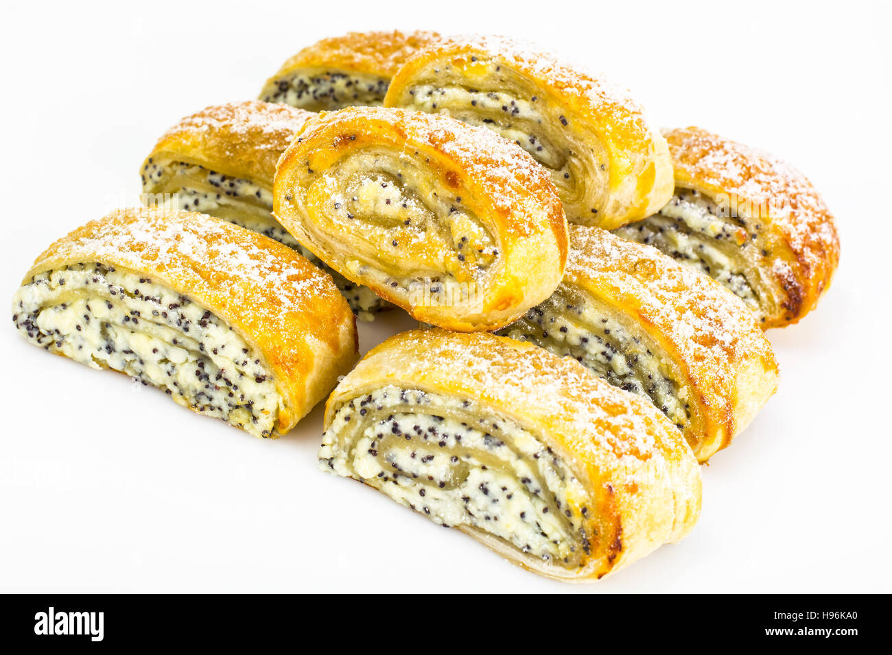 Bun puff pastry with cheese filling on a white. Studio Photo Stock ...
