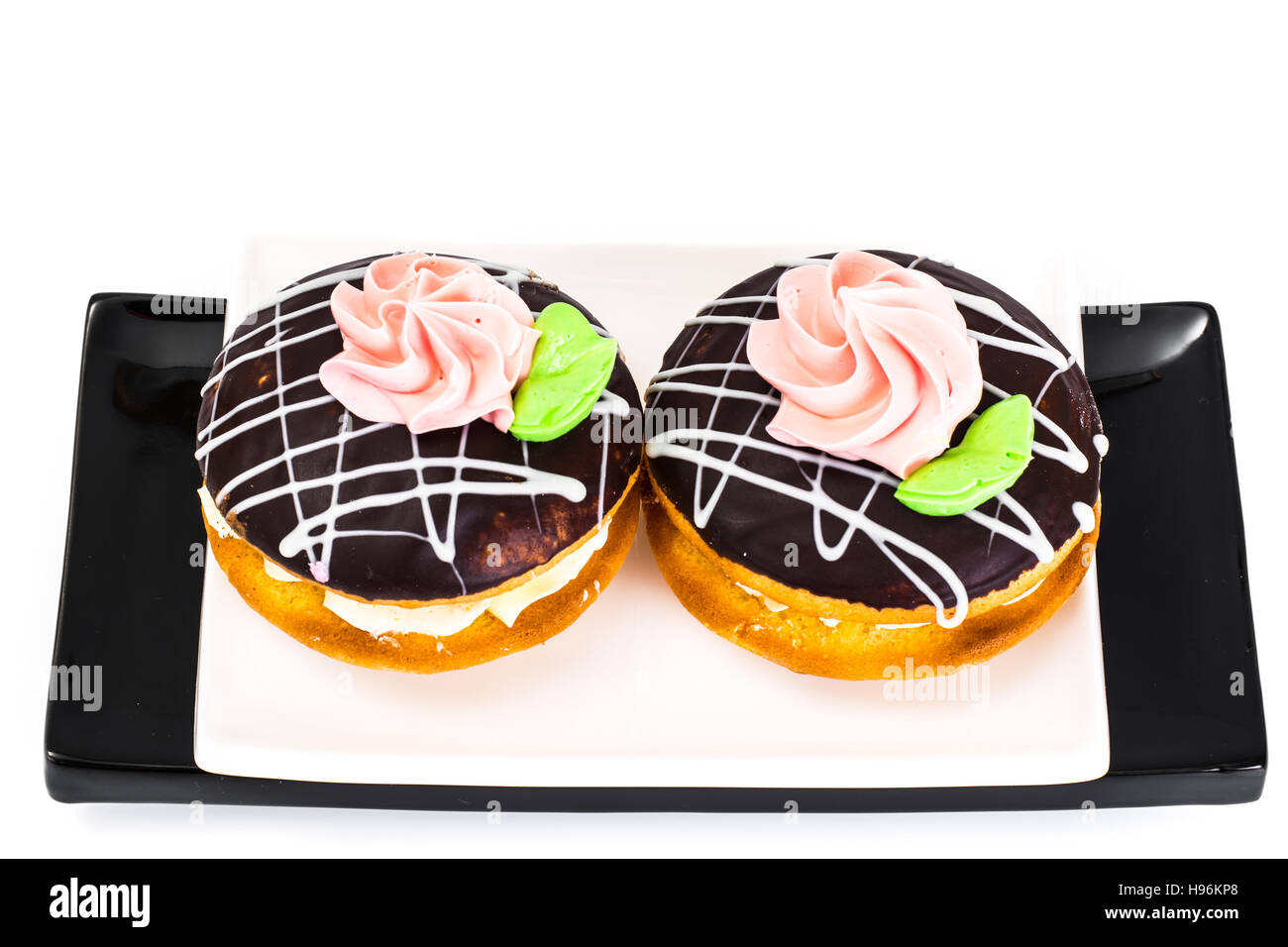 Colorful biscuits cakes bush with icing and custard filling. Studio ...