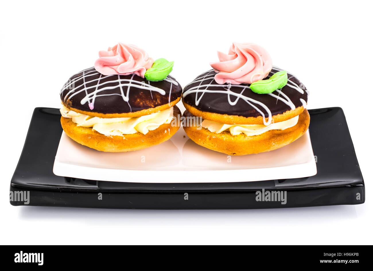 Colorful biscuits cakes bush with icing and custard filling. Studio ...
