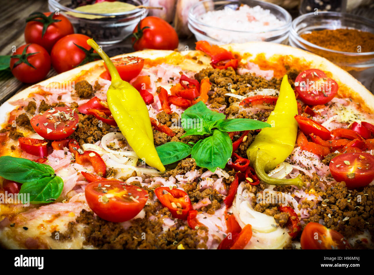 Rustic Italian Pizza on a Thin Pastry with Minced Pork, Ham, Tomatoes ...