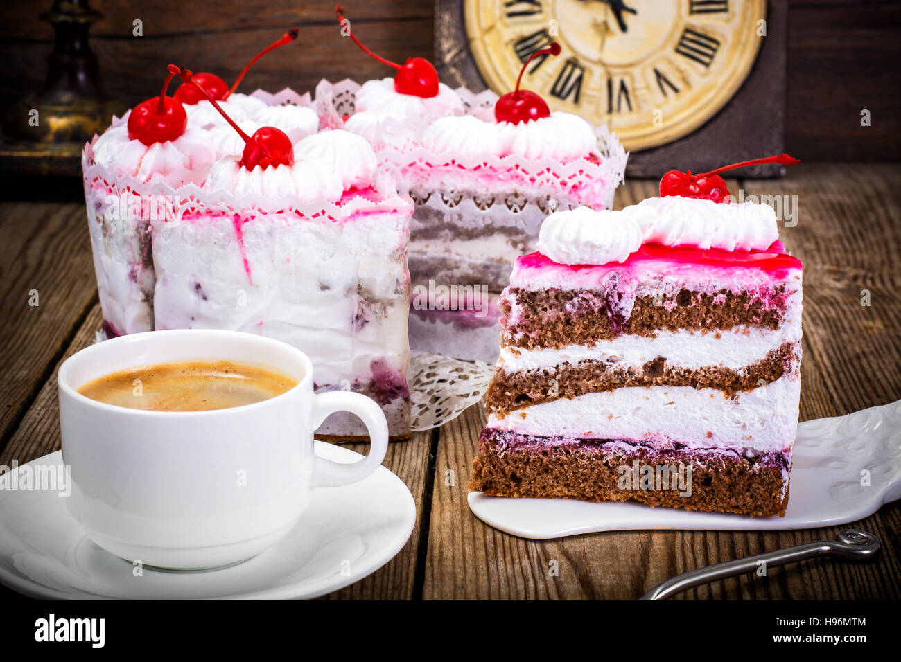 Cup of Coffee, Cake with Cream and Cherry. Sweet Food Stock Photo - Alamy