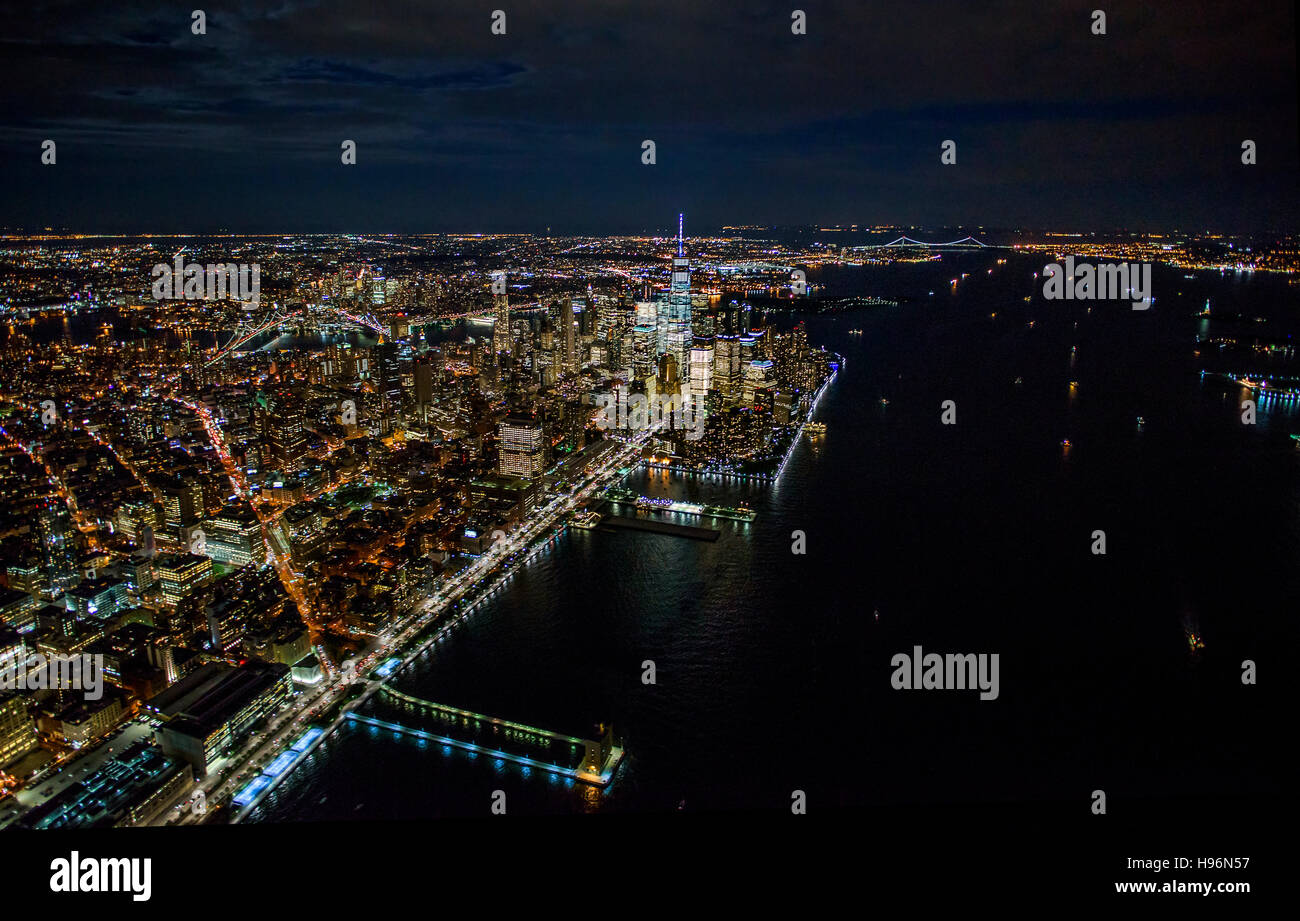 USA, New York, New York City, Aerial view of illuminated skyline at ...