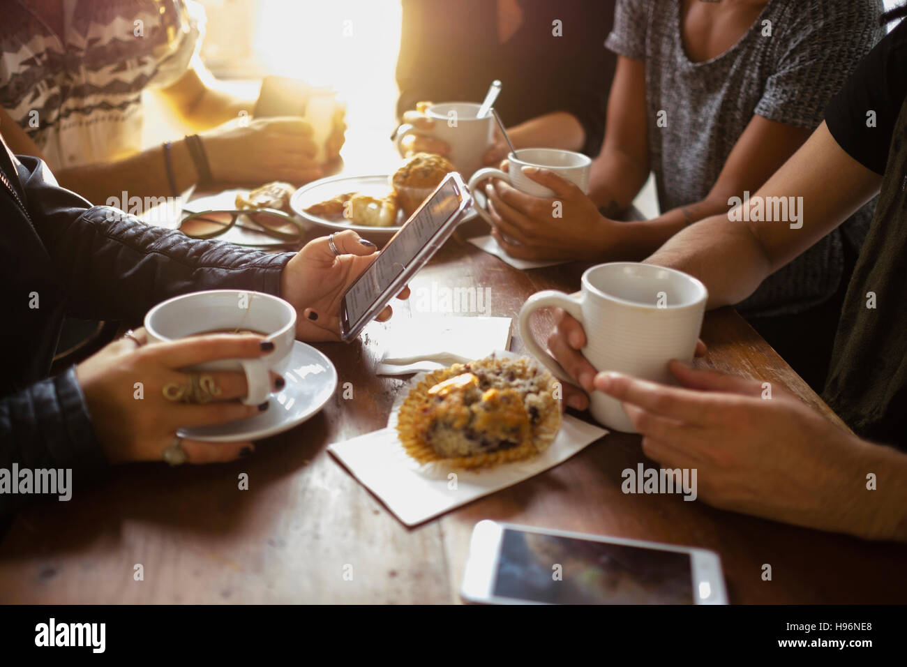 Group of friends in cafe Stock Photo - Alamy