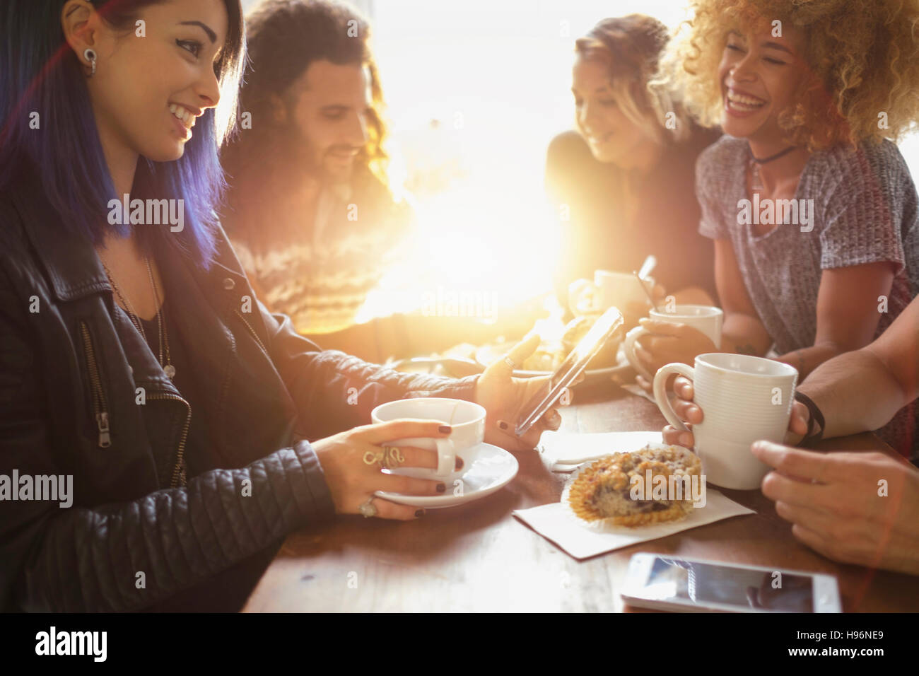 Group of friends in cafe Stock Photo - Alamy