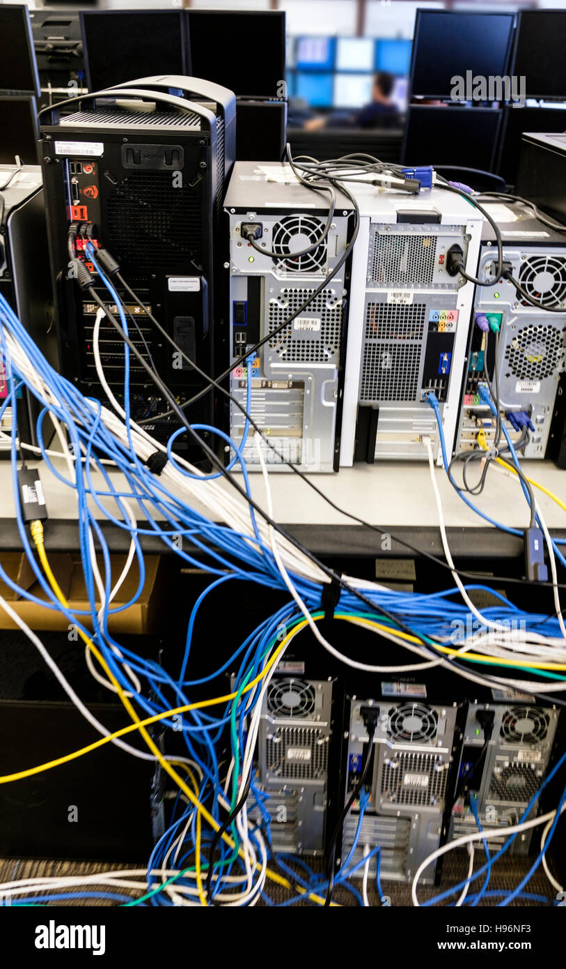 Computers connected with many cables Stock Photo - Alamy