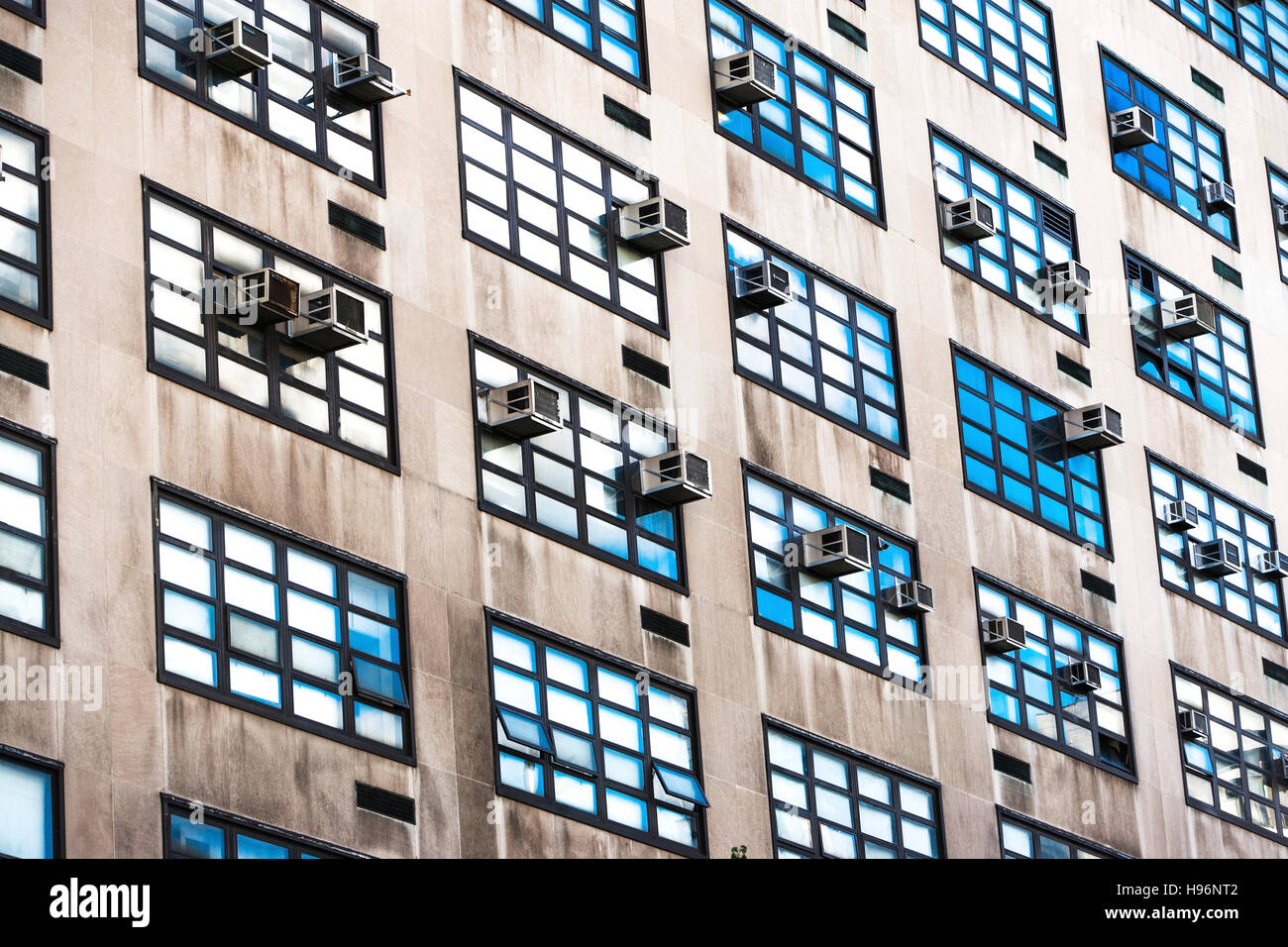 USA, New York State, New York City, Air conditioners on facade of ...
