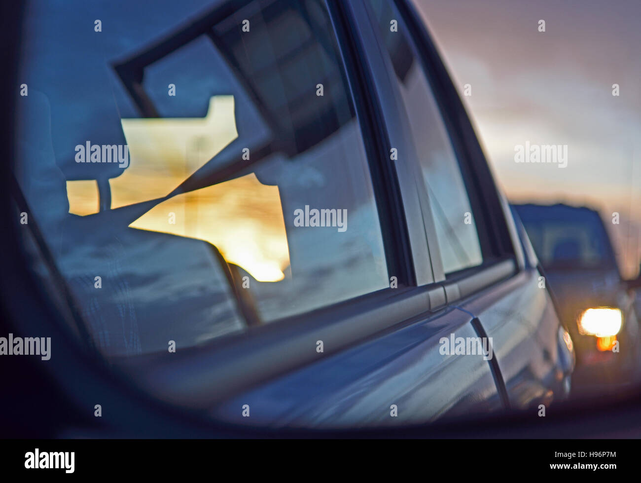 Reflections of city traffic in car's window Stock Photo - Alamy