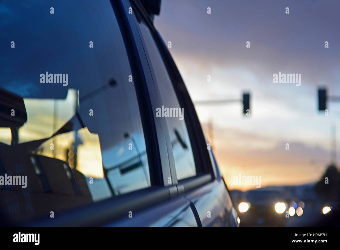 Reflections of city traffic in car's window Stock Photo - Alamy
