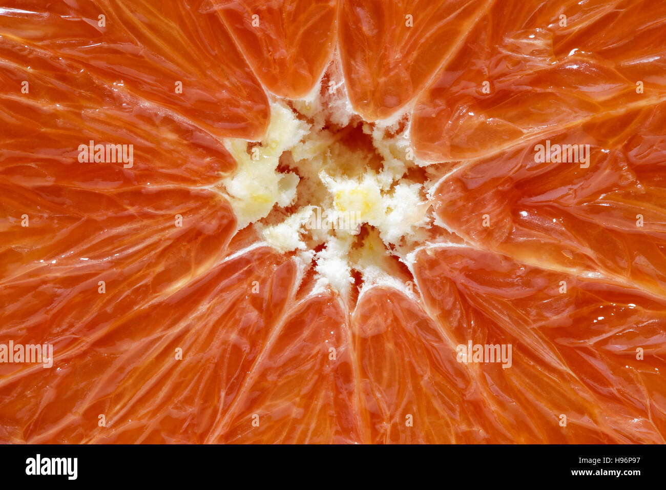 Close up of half of red orange Stock Photo - Alamy