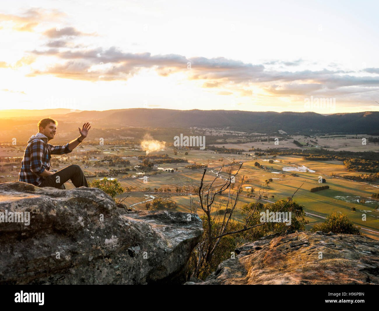 Australia, New South Wales, Man waving on Mount York Stock Photo - Alamy