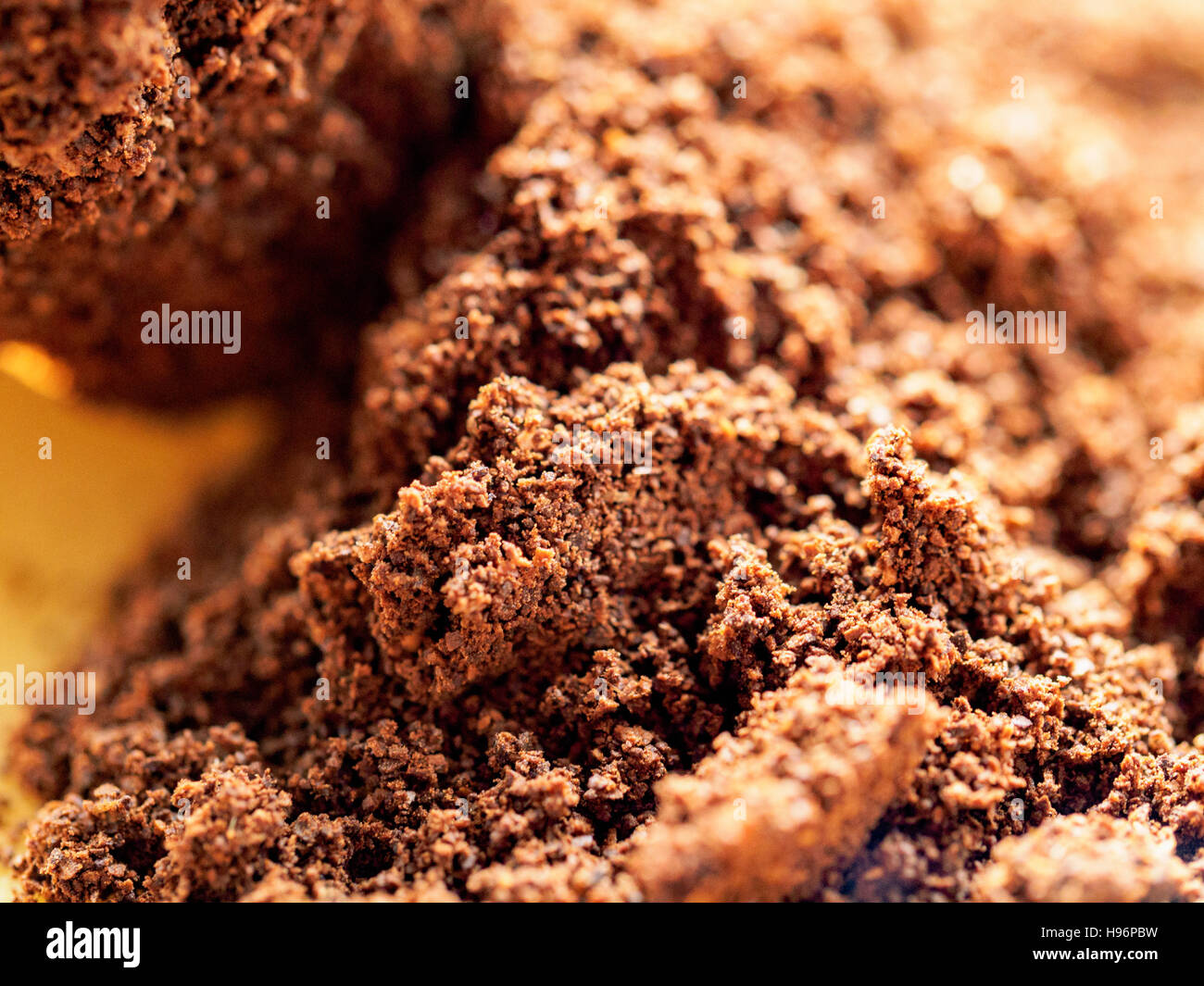 Heap of brown ground coffee Stock Photo - Alamy