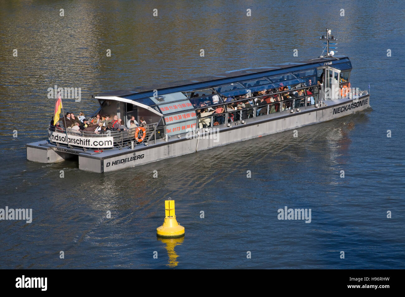 Neckarsonne solar ferry with passengers, on Neckar River, solar energy ...