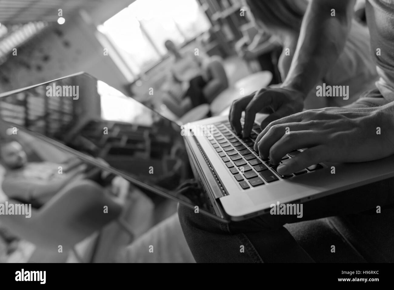 Businessman typing on laptop in Black and White Stock Photos & Images ...