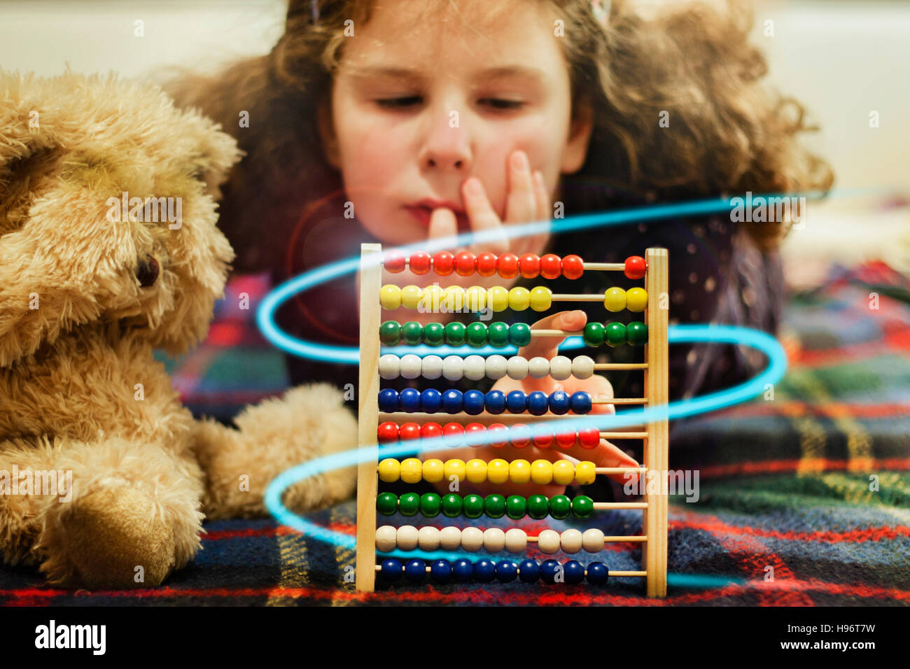 Girl learning basic mathematics with educational toy Stock Photo - Alamy