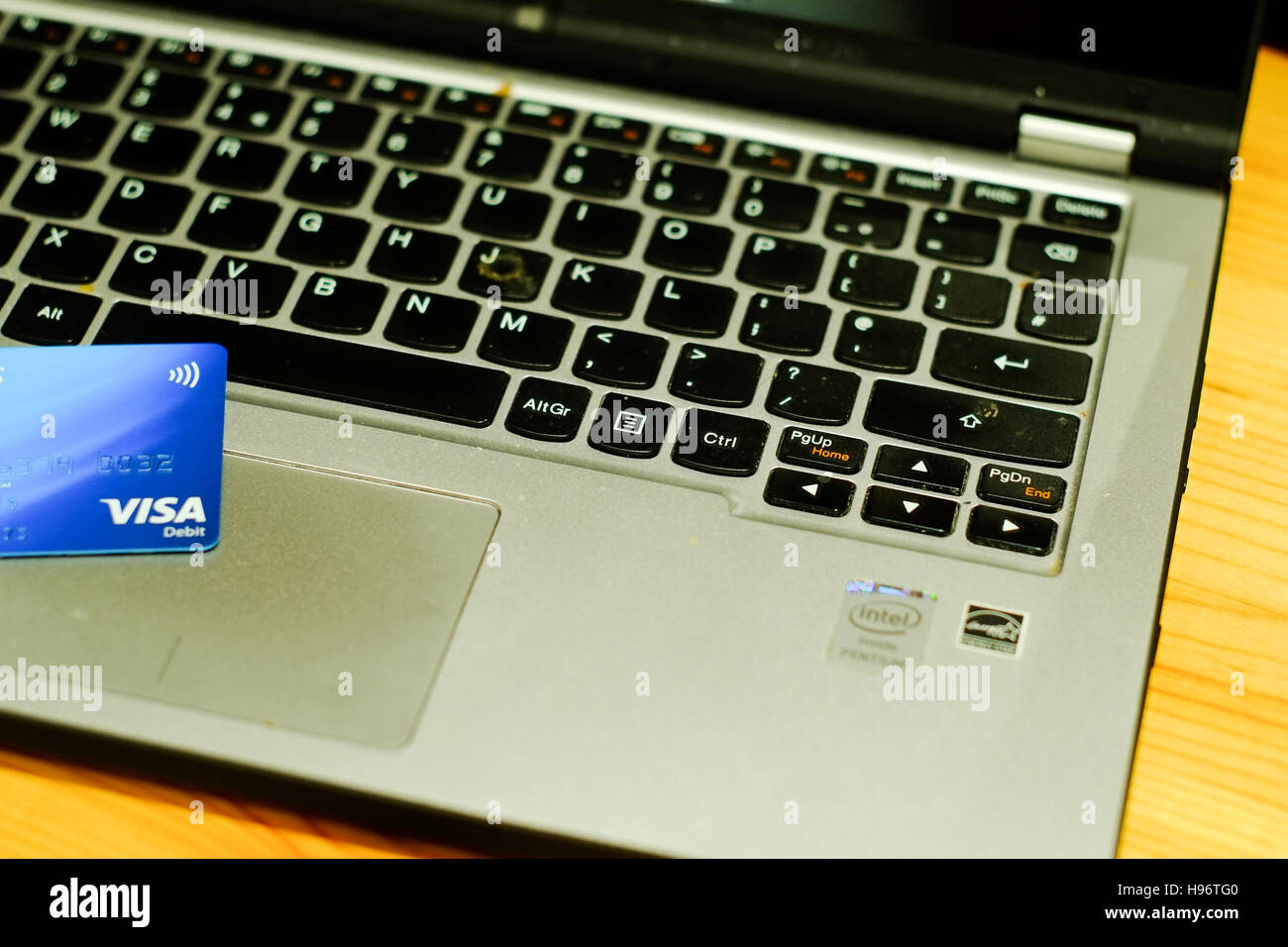 Debit Card on Laptop Stock Photo - Alamy