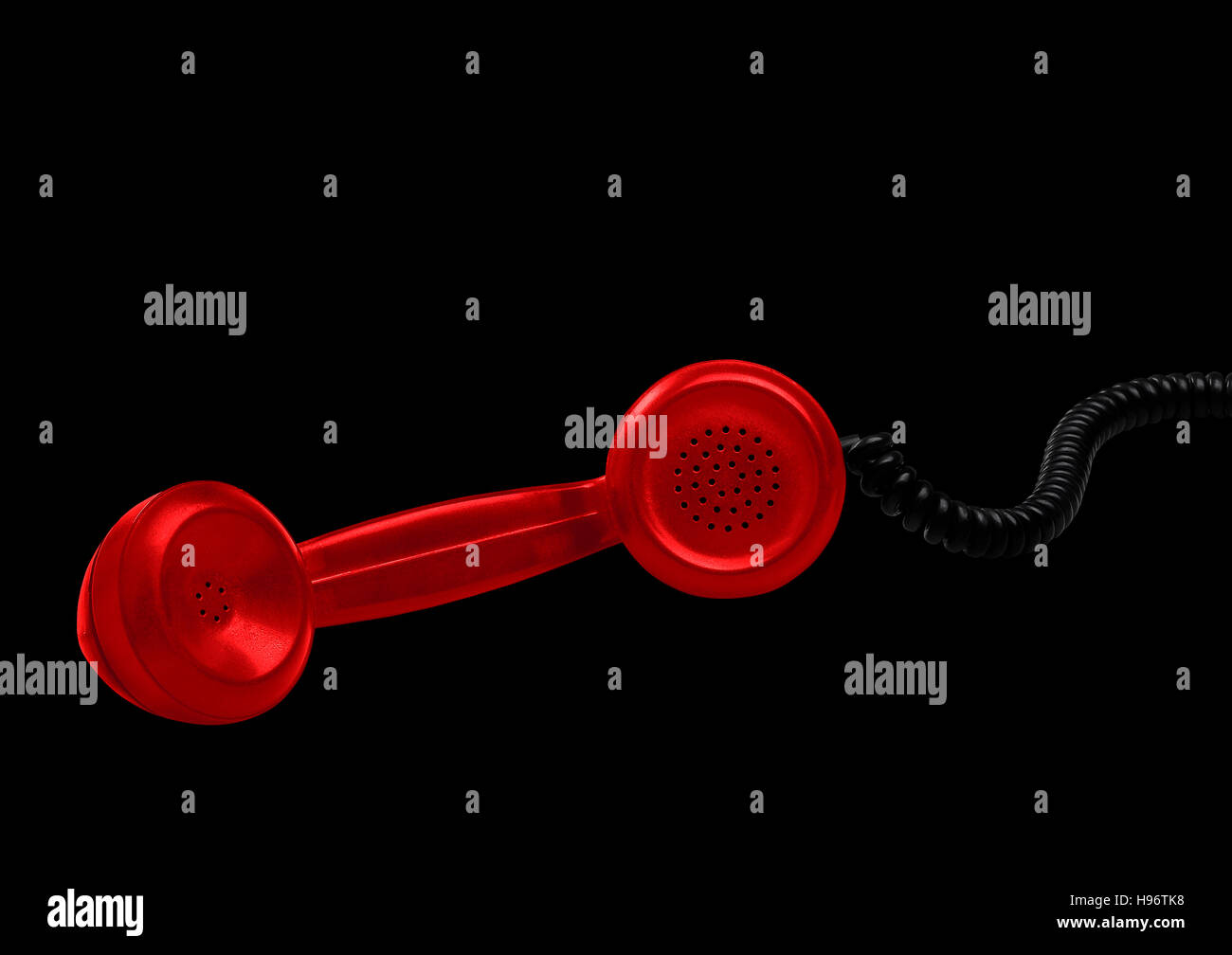 Red telephone receiver (isolated) on black background Stock Photo - Alamy