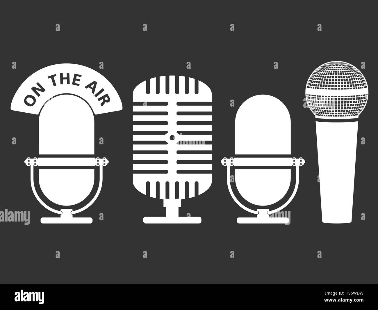 White microphone icons on dark background Stock Photo - Alamy