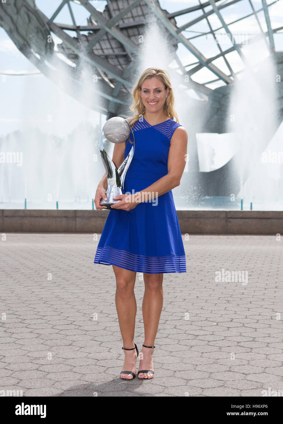 ANGELIQUE KERBER (GER) with the US Open 2016 trophy at the Unisphere in ...