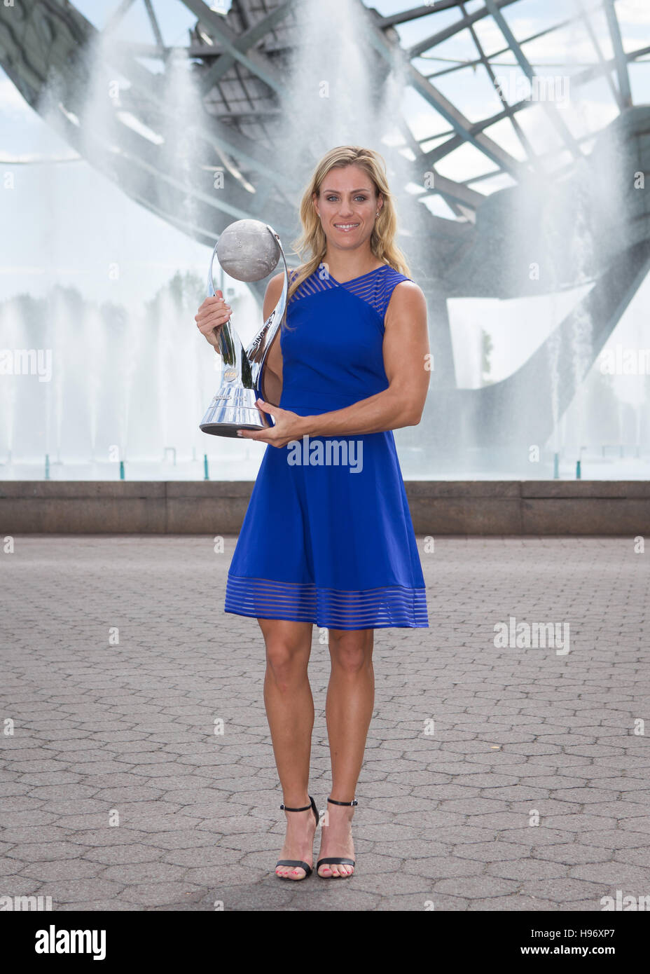 ANGELIQUE KERBER (GER) with the US Open 2016 trophy at the Unisphere in ...