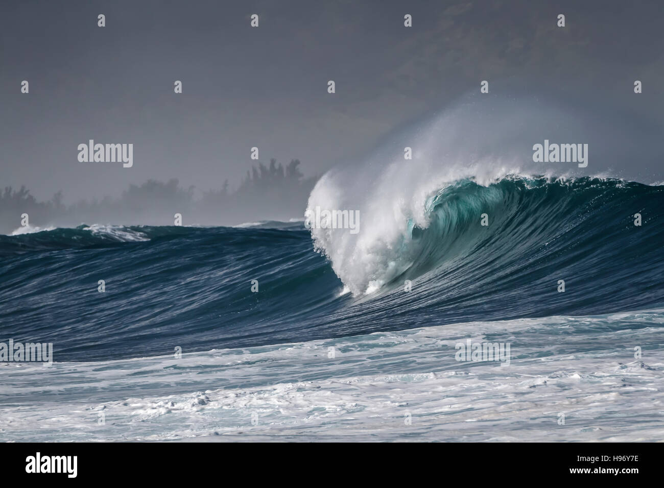 Breaking Ocean wave at Waimea bay on the north shore of Oahu Hawaii ...