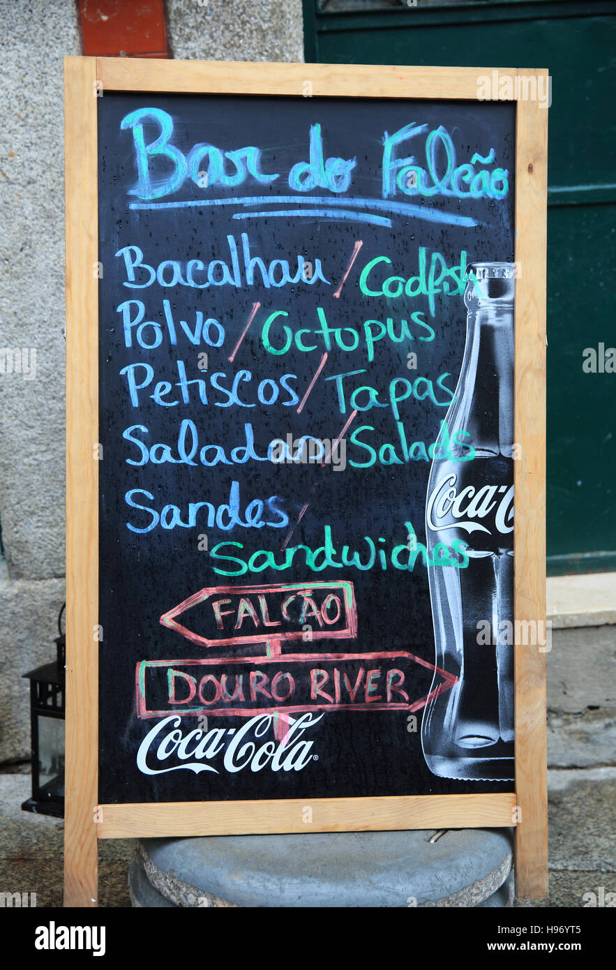 Menu board at the entrance to the Bar do Falcao on historical Place de ...