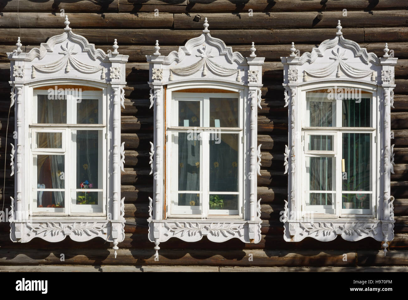 Tomsk, Windows, old wooden houses, decorated with traditional wood ...