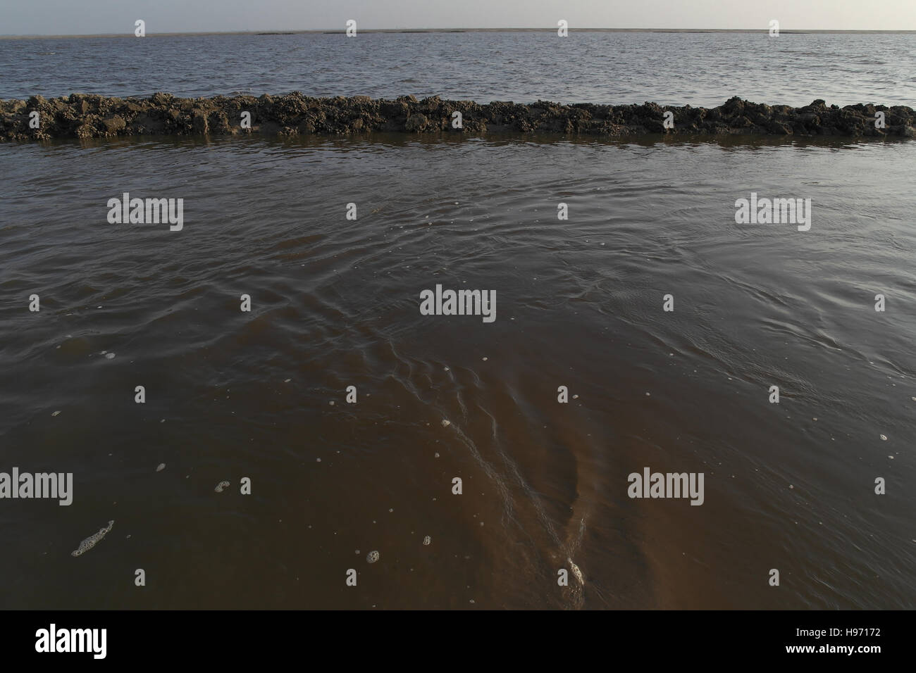 Blue sky view, across low water channel River Ribble, North Training ...