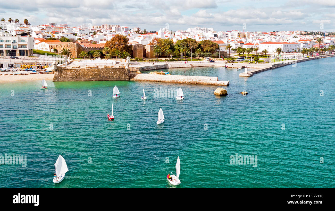 Aerial from sailing in the harbor from Lagos in the Algarve Portugal ...