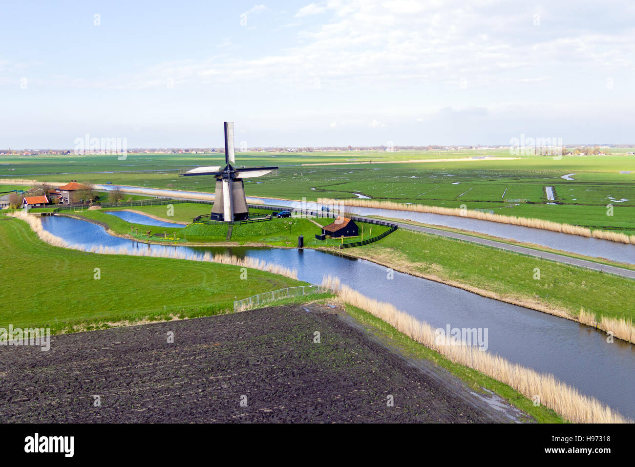 Traditional windmill in a dutch landscape in the Netherlands Stock ...