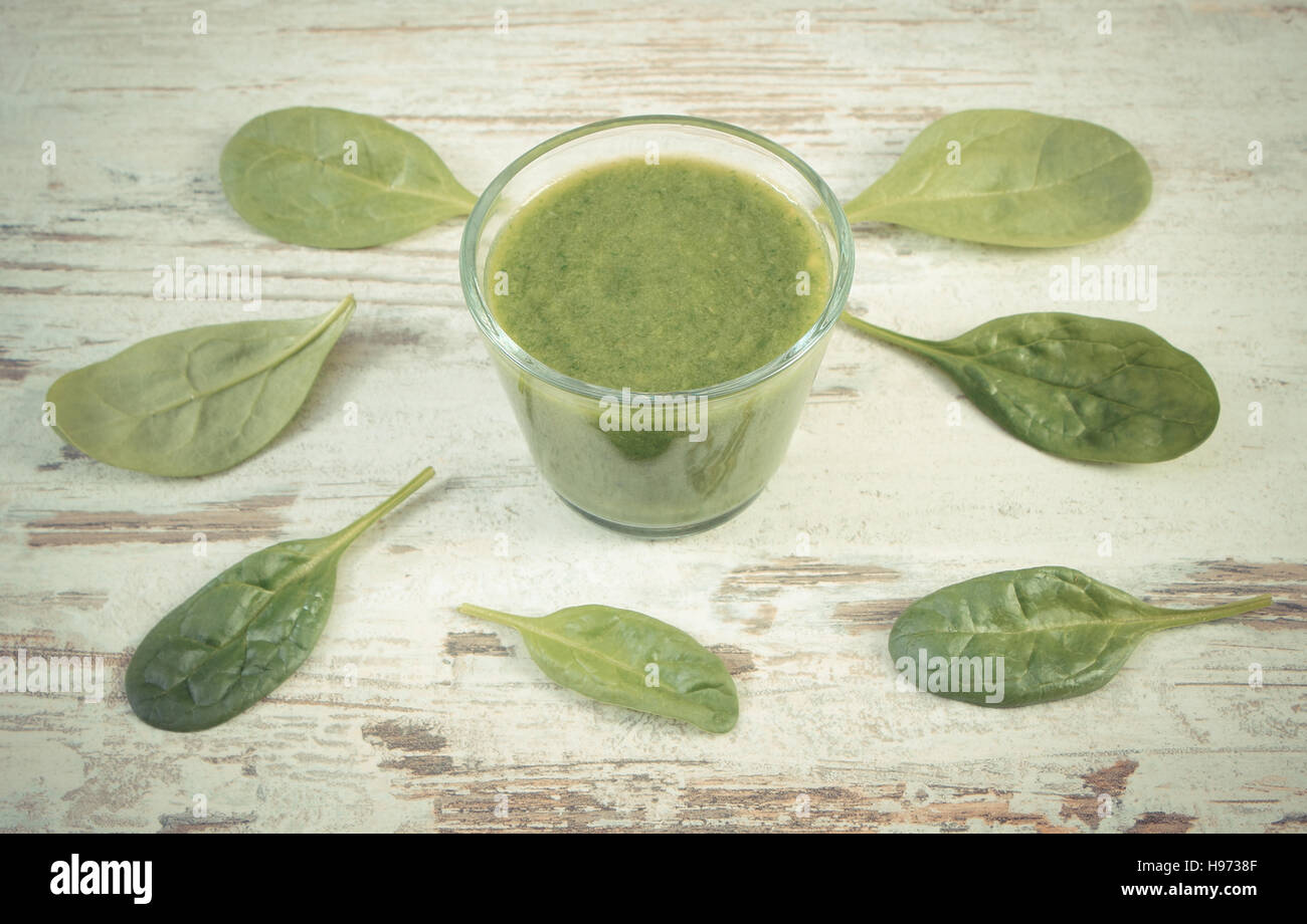 Vintage photo, Fresh green nutritious cocktail from spinach on old ...