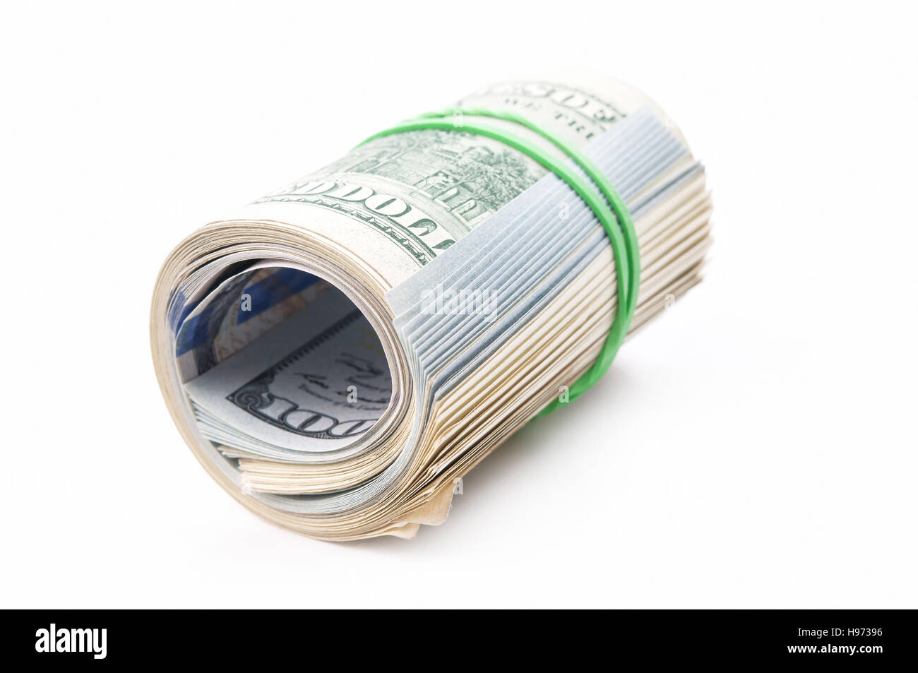dollars roll isolated on white background Stock Photo - Alamy