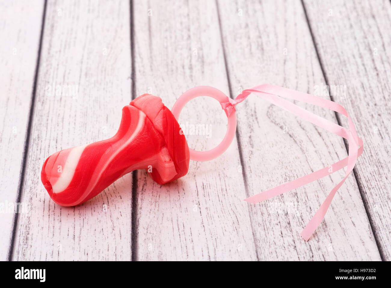 A traditional English seaside sweet candy rock pacifier dummy Stock ...