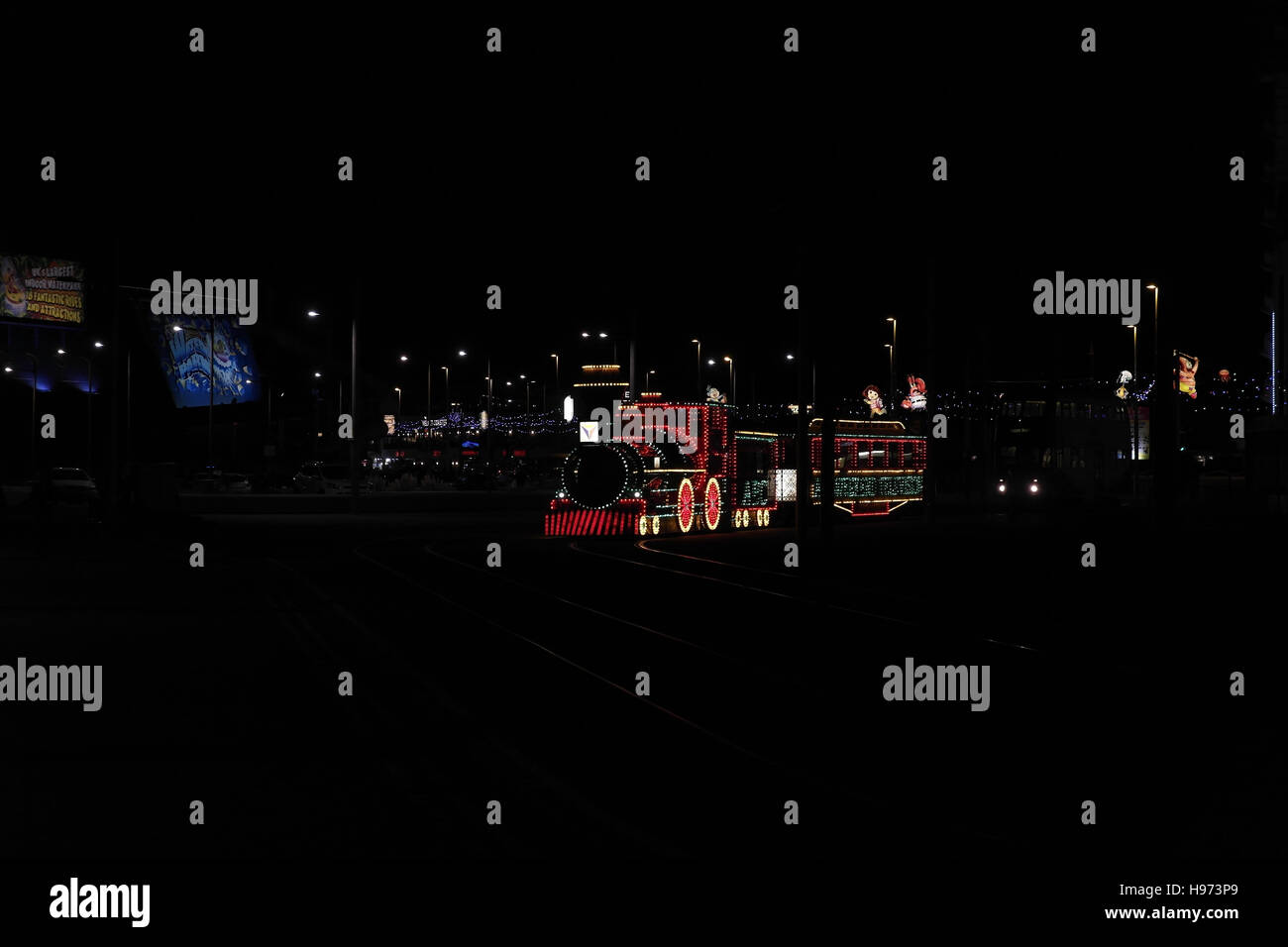 Night view, north to Sandcastle Water Park, illuminated Western Train ...