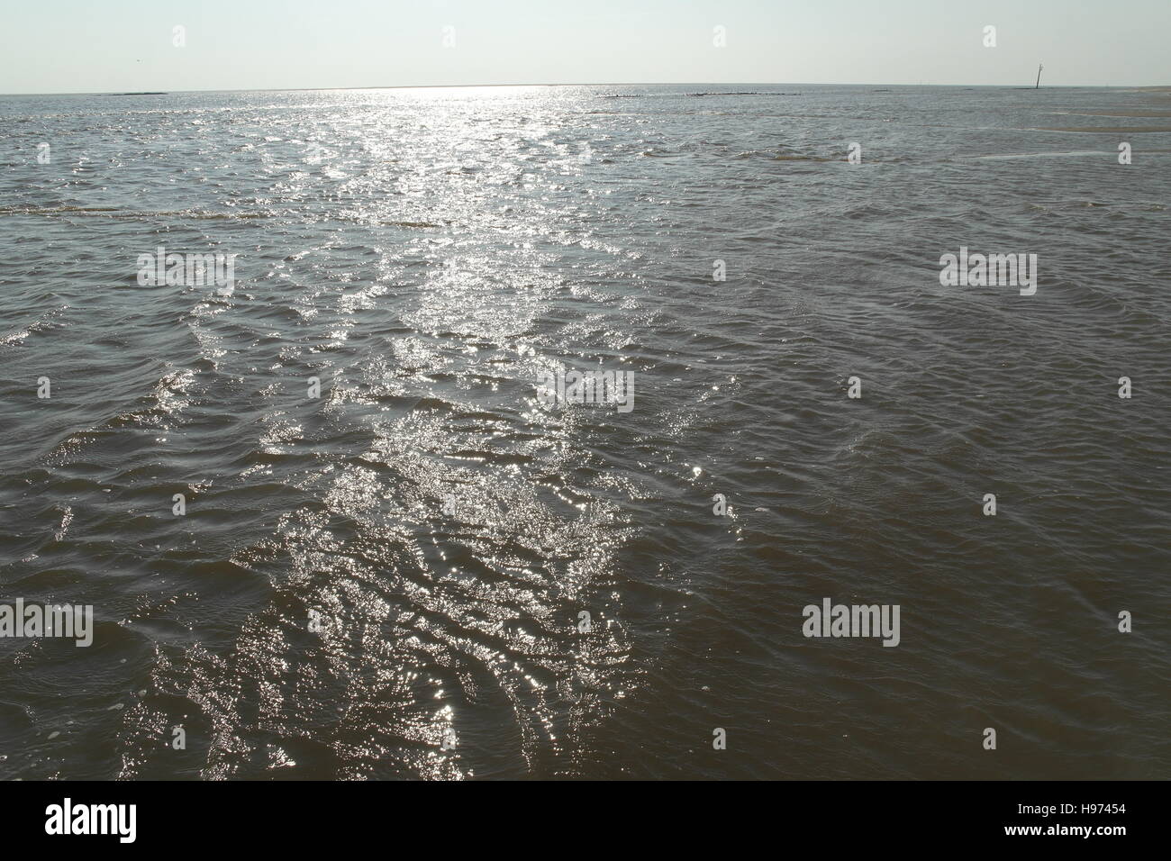 Blue sky view, looking downstream, beach and River Ribble training ...