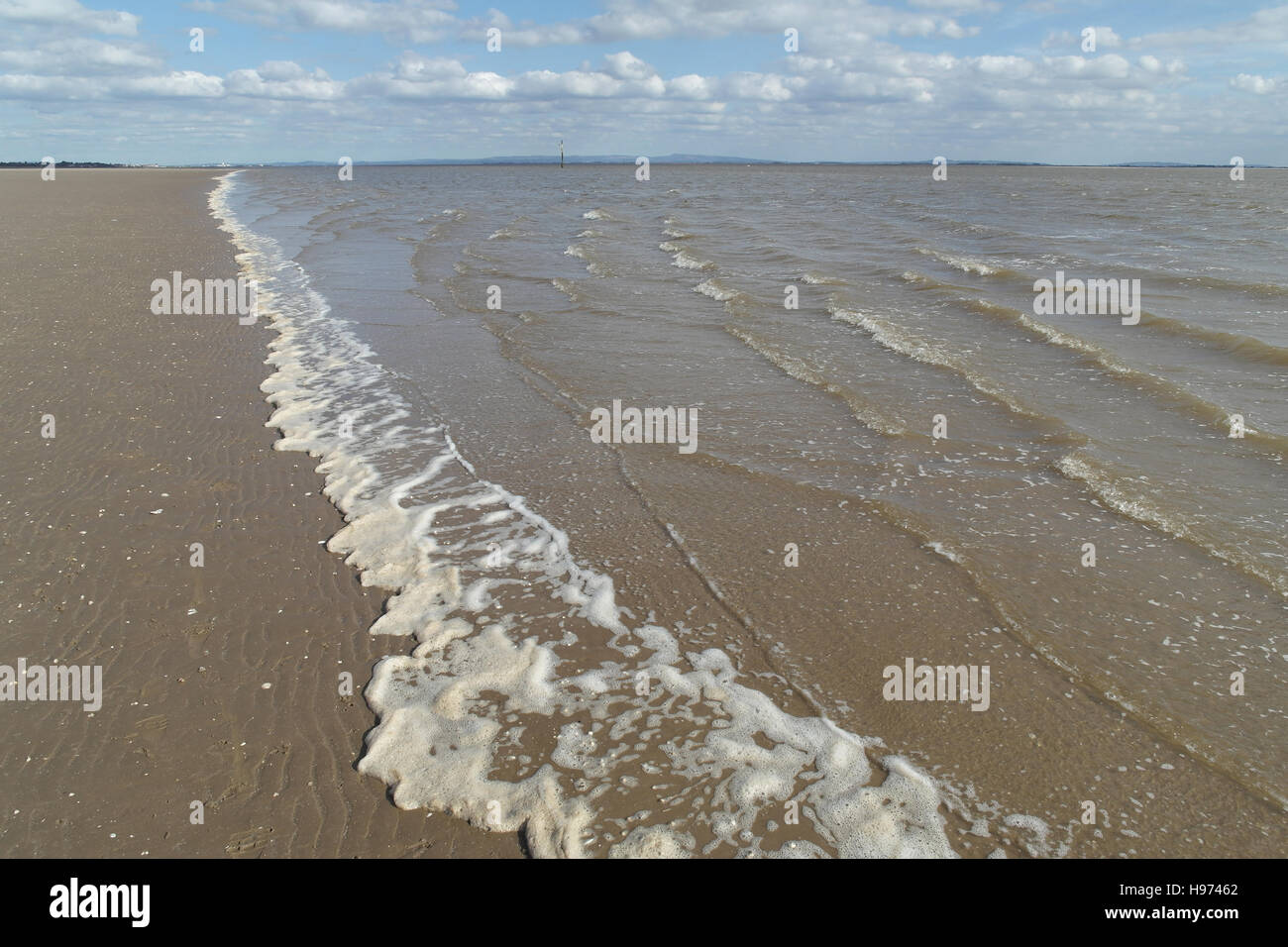 Small waves from River Ribble channel, upstream to Lytham and West ...