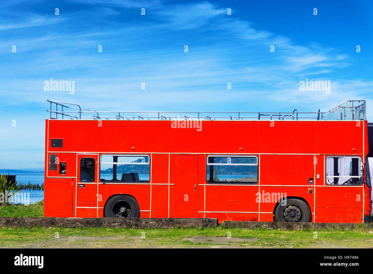 View of an old red bus in Astoria, Oregon Stock Photo - Alamy