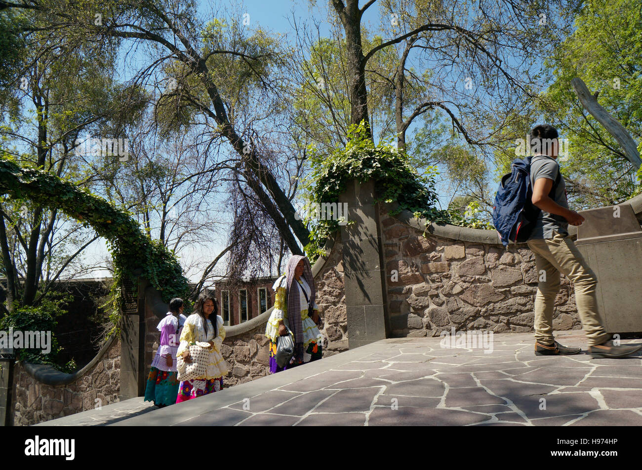 Mexican people walk up stairs to the La Iglesia del Cerrito at the top ...
