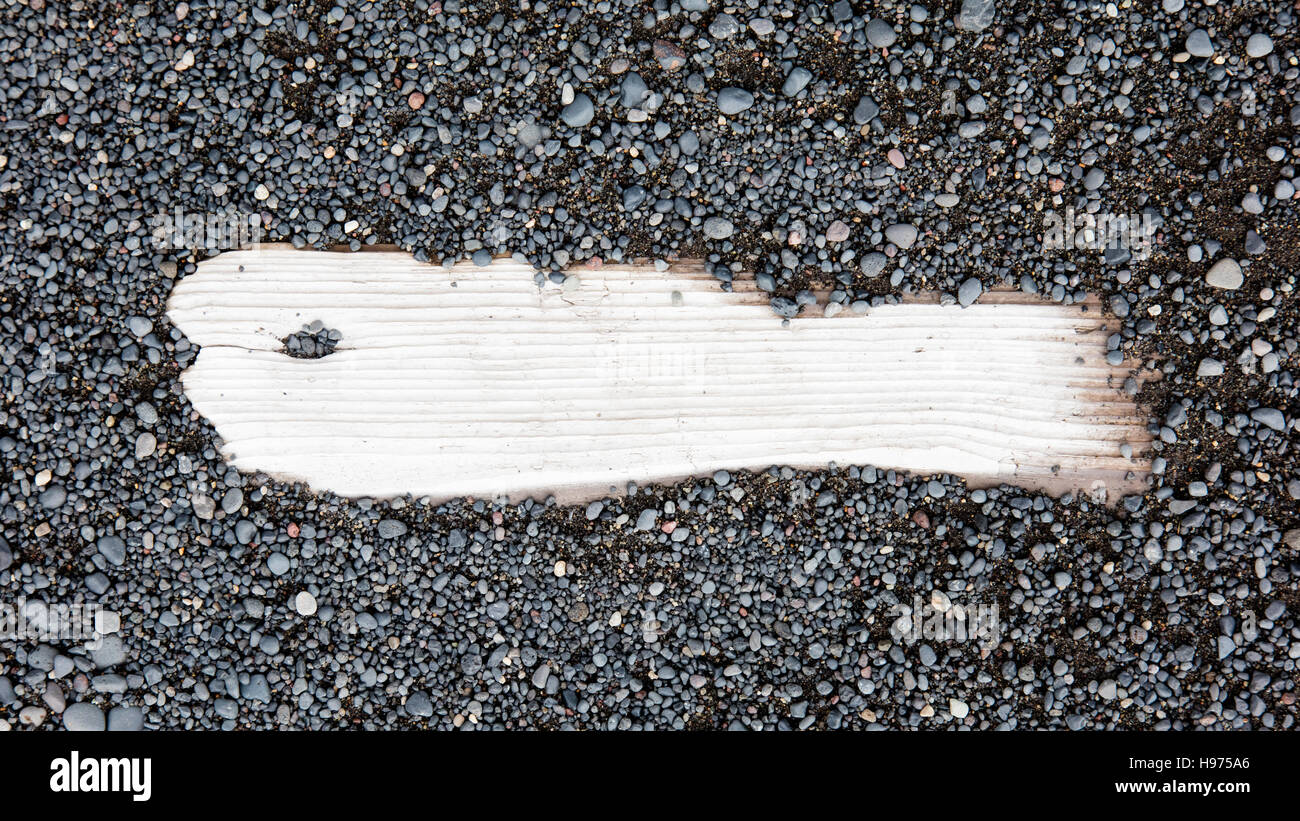 Sand on planked wood, black Icelandic sand Stock Photo - Alamy