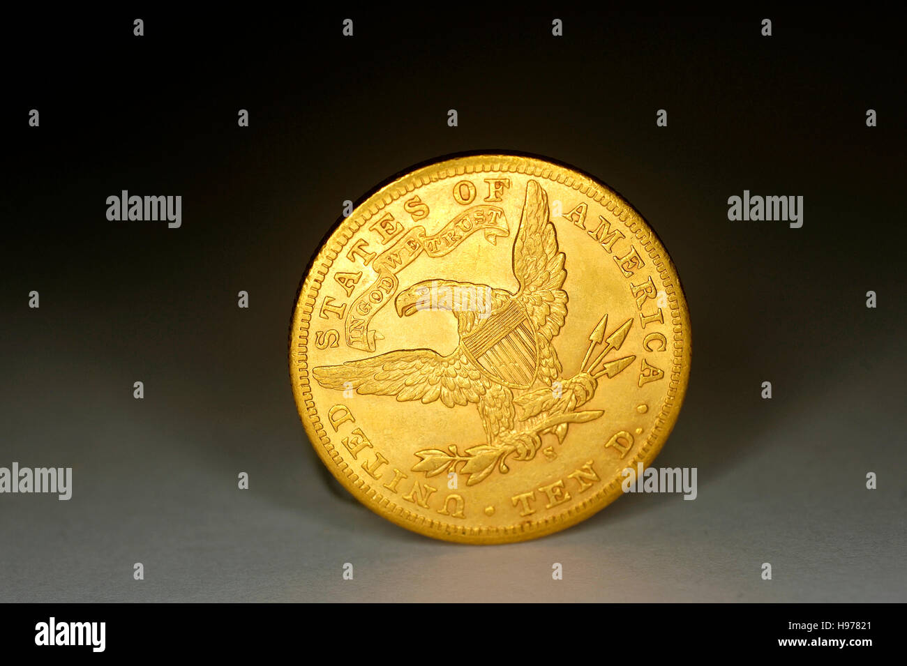a coin ten dollar gold Stock Photo - Alamy