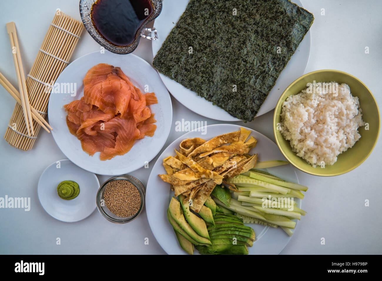 A number of ingredients on plates ready to make sushi Stock Photo - Alamy