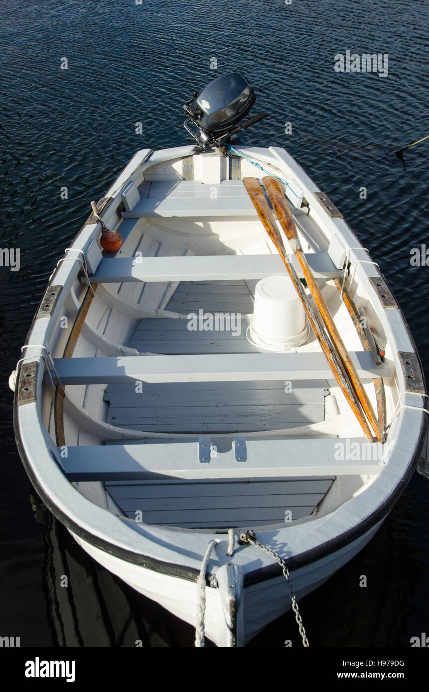 one little row boat in harbour on the swedish westcoast Stock Photo - Alamy