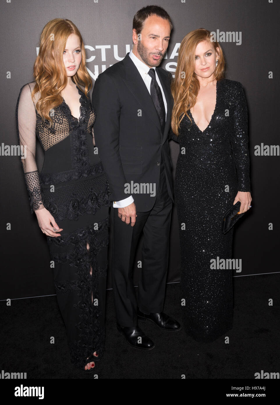 New York City, USA - November 17, 2016: (L-R) Ellie Bamber, Tom Ford ...