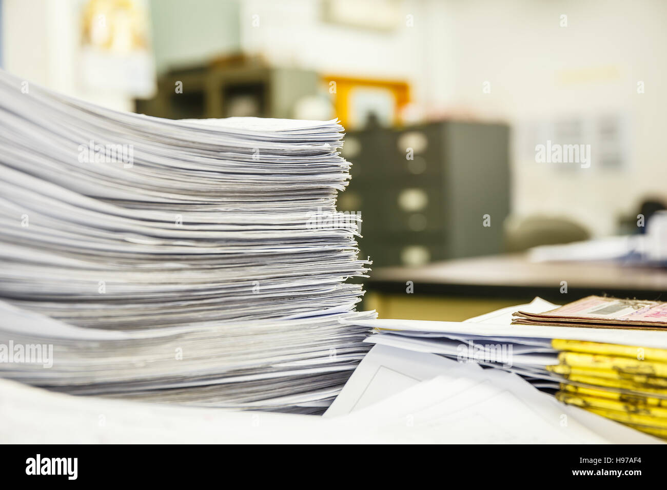 A pile of documents Desk Stock Photo - Alamy