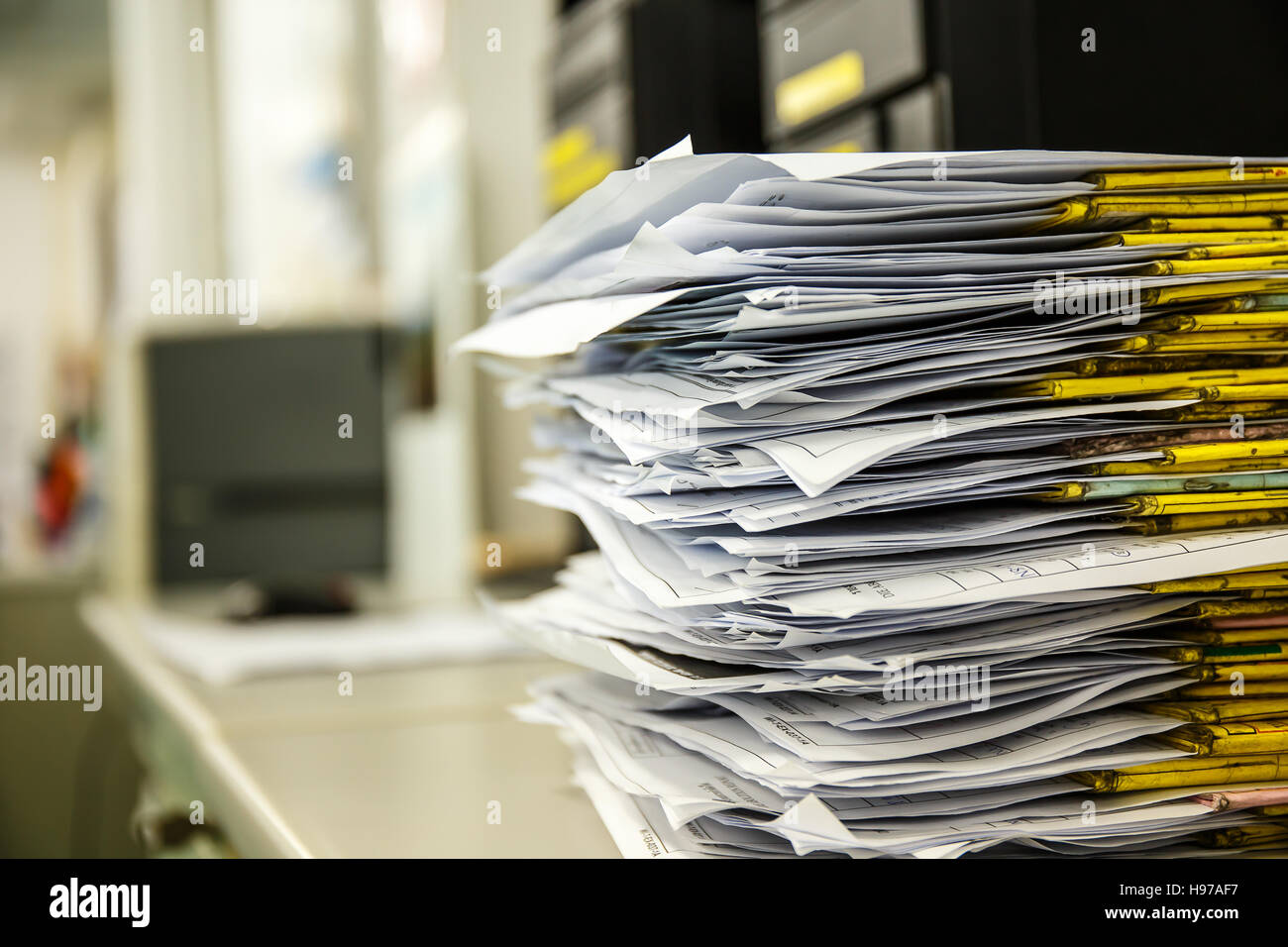 A pile of documents Desk Stock Photo - Alamy