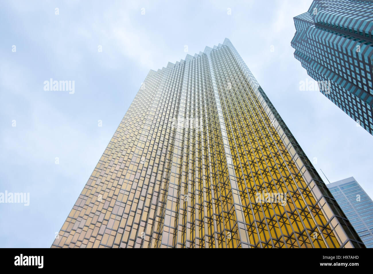 Facade of gold and brown glass skyscrapers in Toronto downtown at low ...