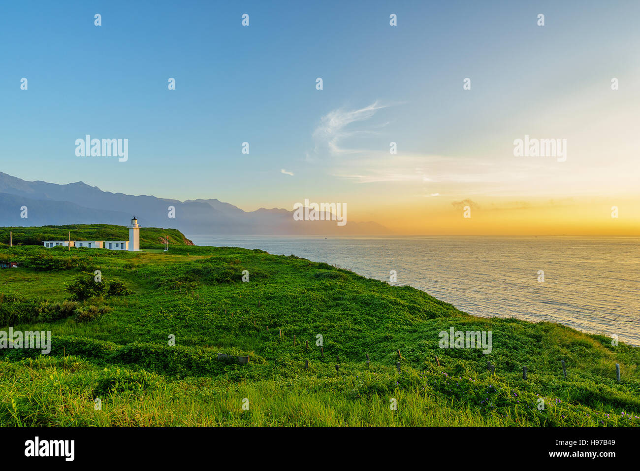 Lighthouse in the morning light Stock Photo - Alamy