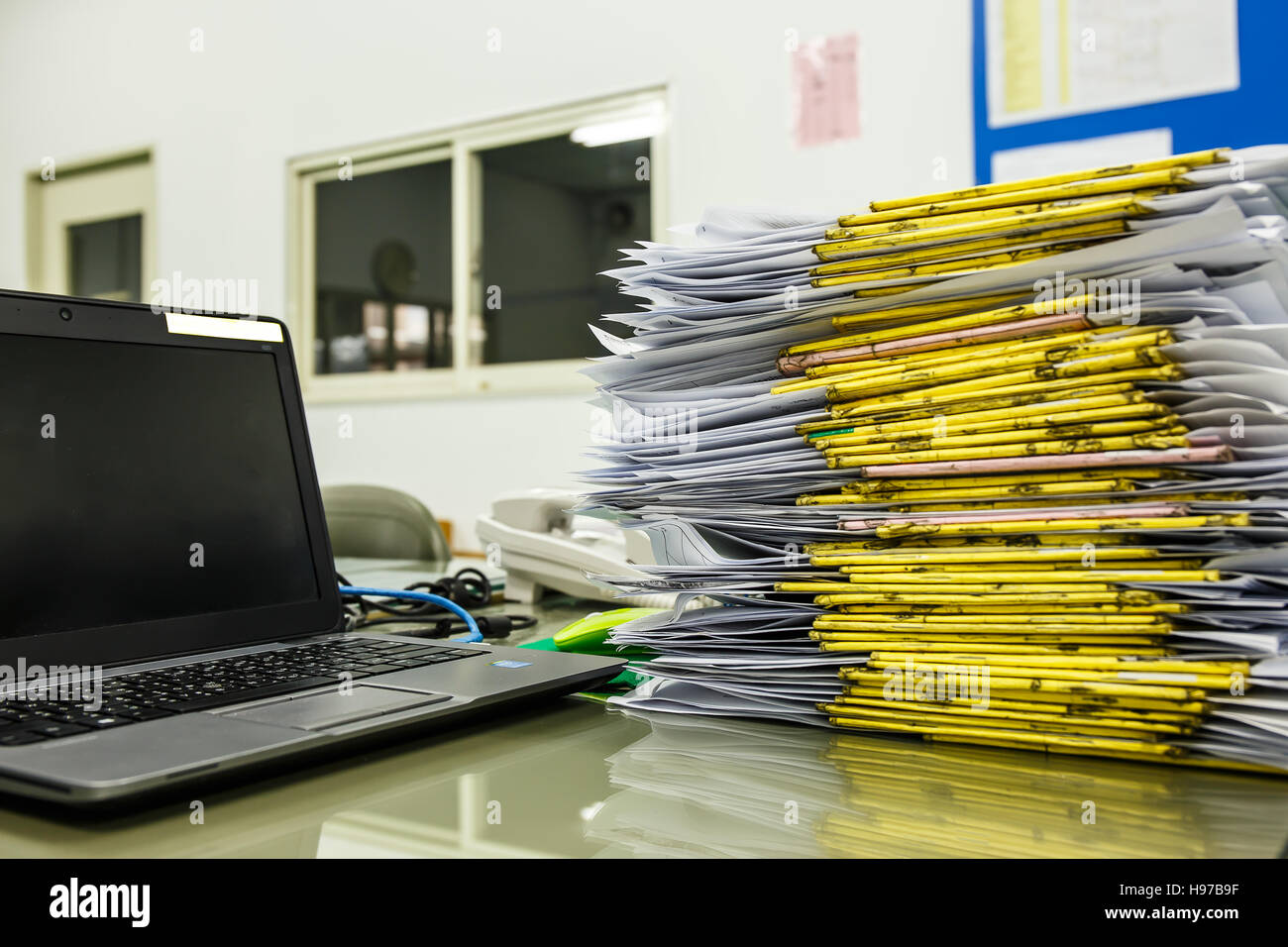 A pile of documents Desk Stock Photo - Alamy