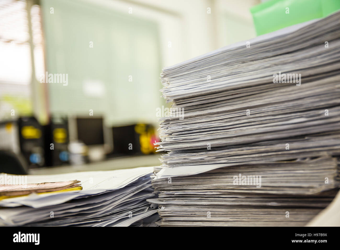 A pile of documents Desk Stock Photo - Alamy