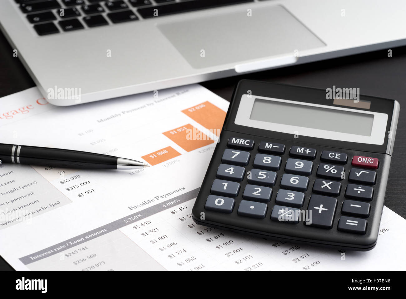 Financial paper charts and graphs on the table Stock Photo - Alamy